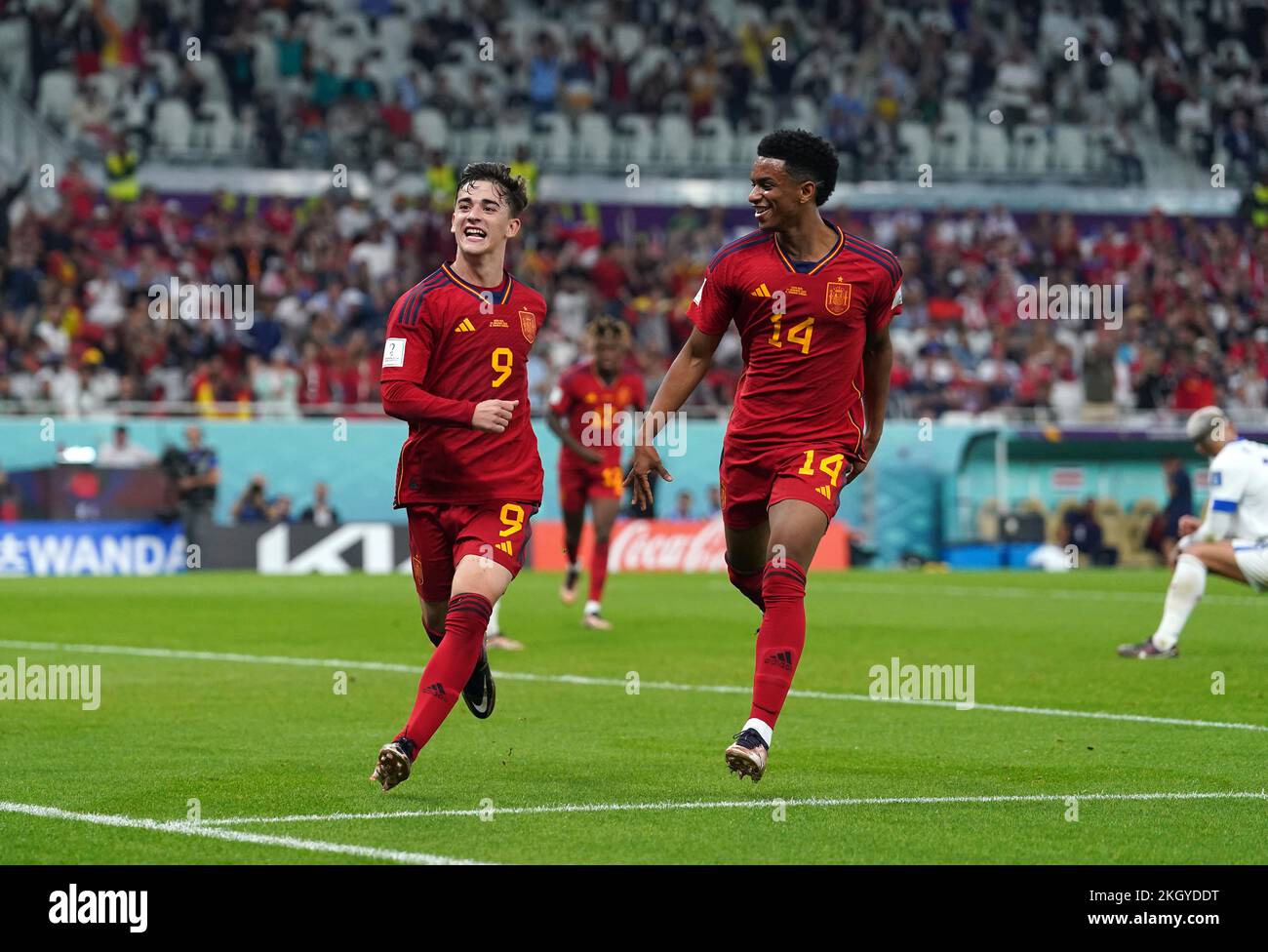 Spain's Gavi (left) celebrates scoring their side's fifth goal of the ...