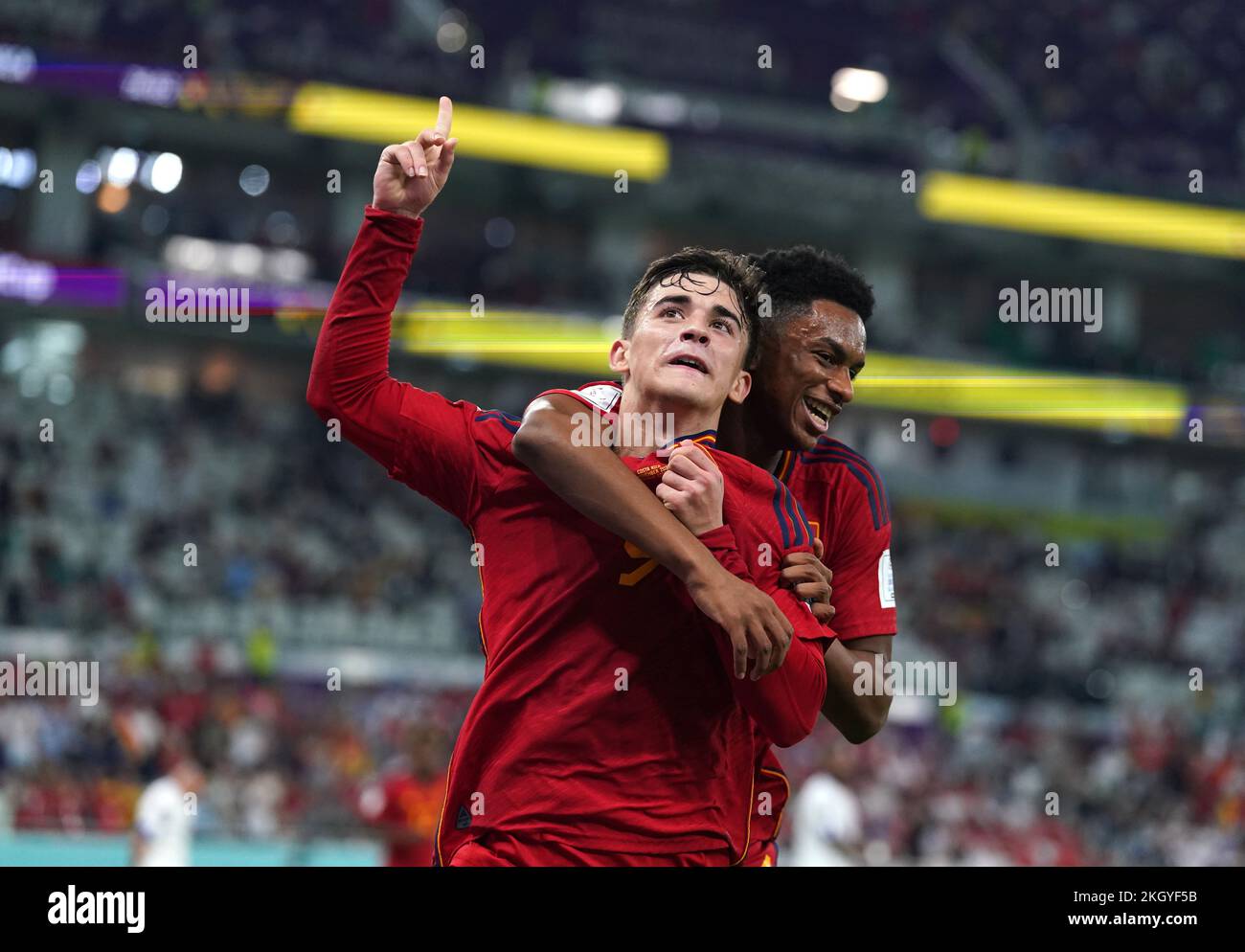 Spain's Gavi (left) celebrates scoring their side's fifth goal of the ...