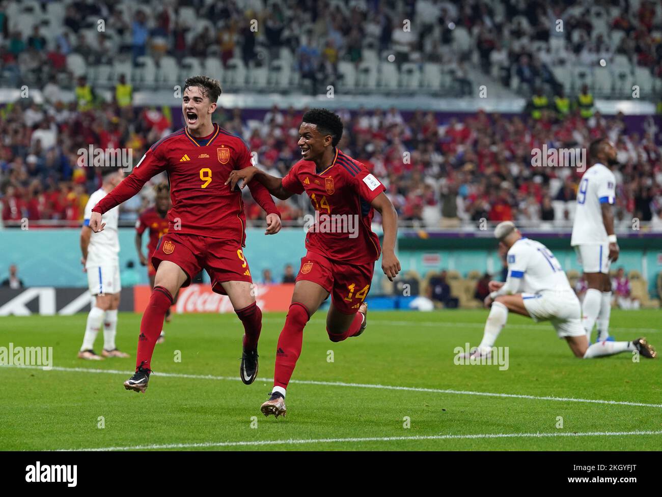 Spain's Gavi (left) celebrates scoring their side's fifth goal of the ...