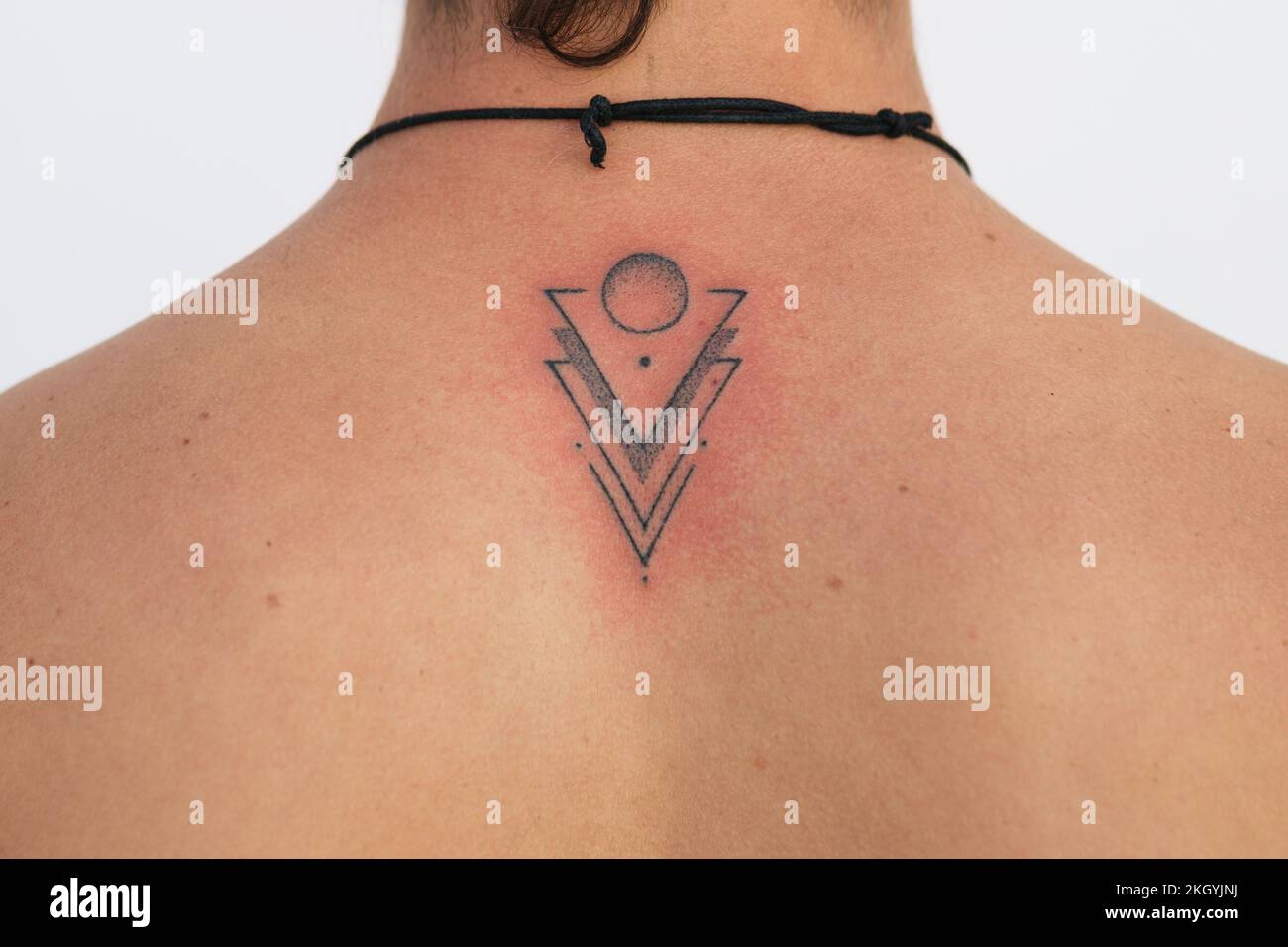 Detail of recent tattoo finished with the red skin irritation ...