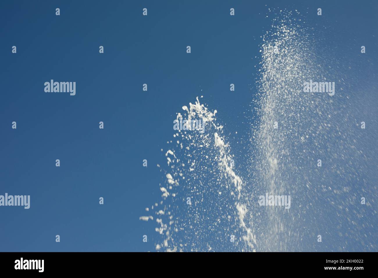 Jets of water against sky. Fountain in city. Details of fountain on ...