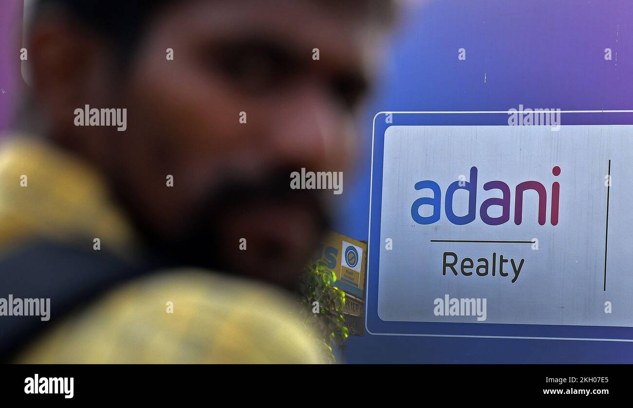 Adani logo is seen on a poster in Mumbai. Adani group is a diversified ...