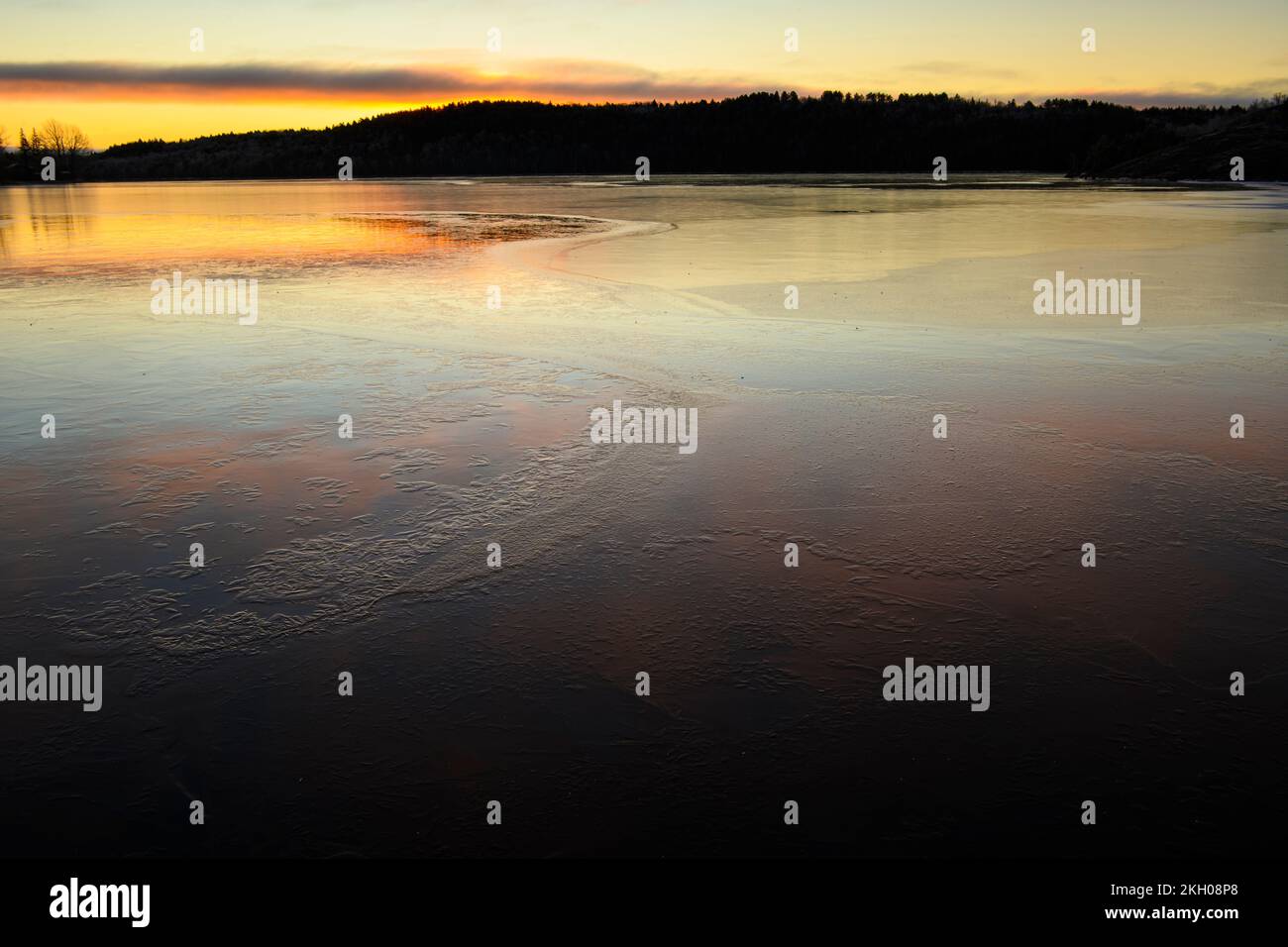 Frozen Simon Lake at dawn, Greater Sudbury, Ontario, Canada Stock Photo ...