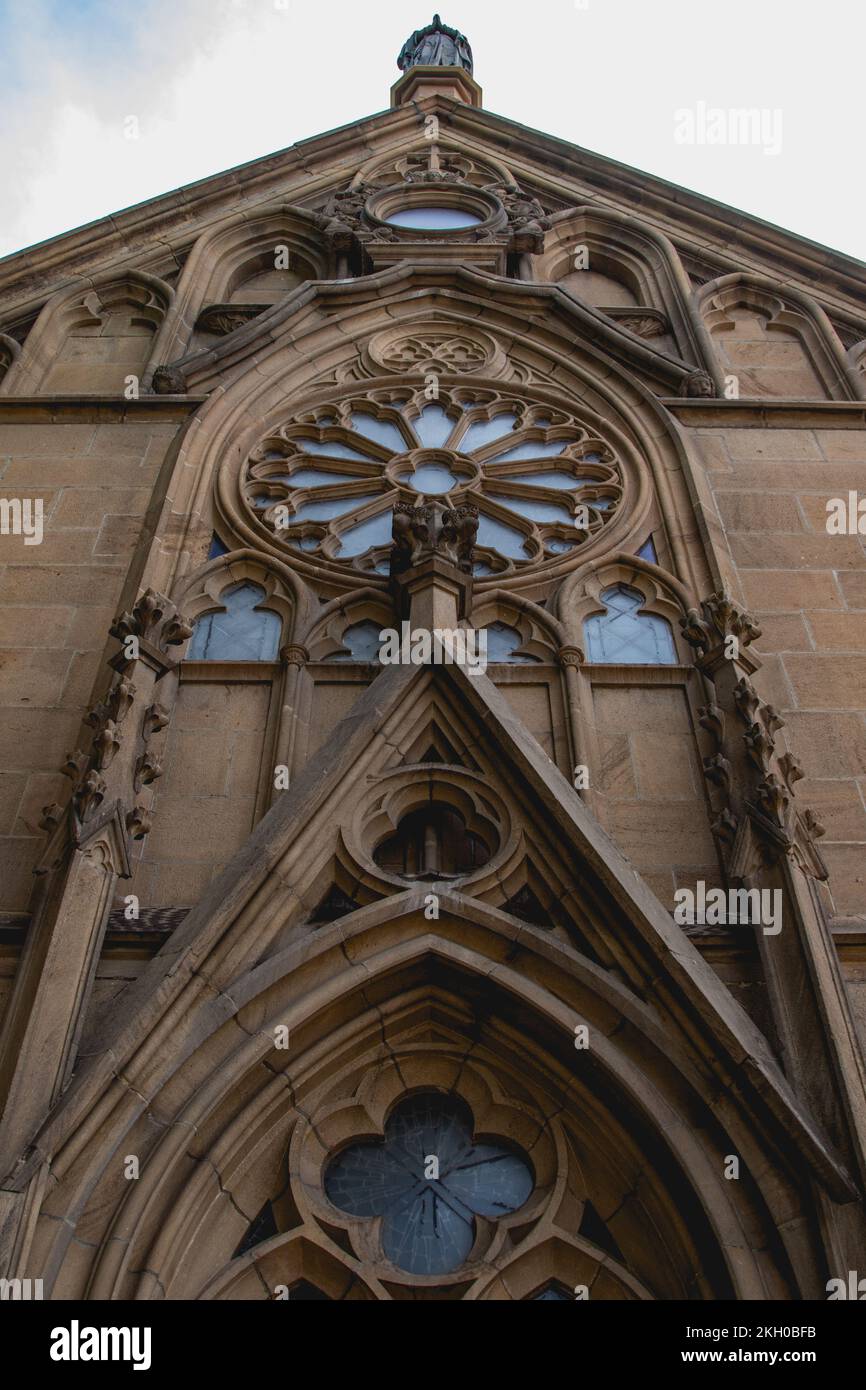 A vertical low angle view of the Loretto Chapel in Santa Fe, New Mexico ...