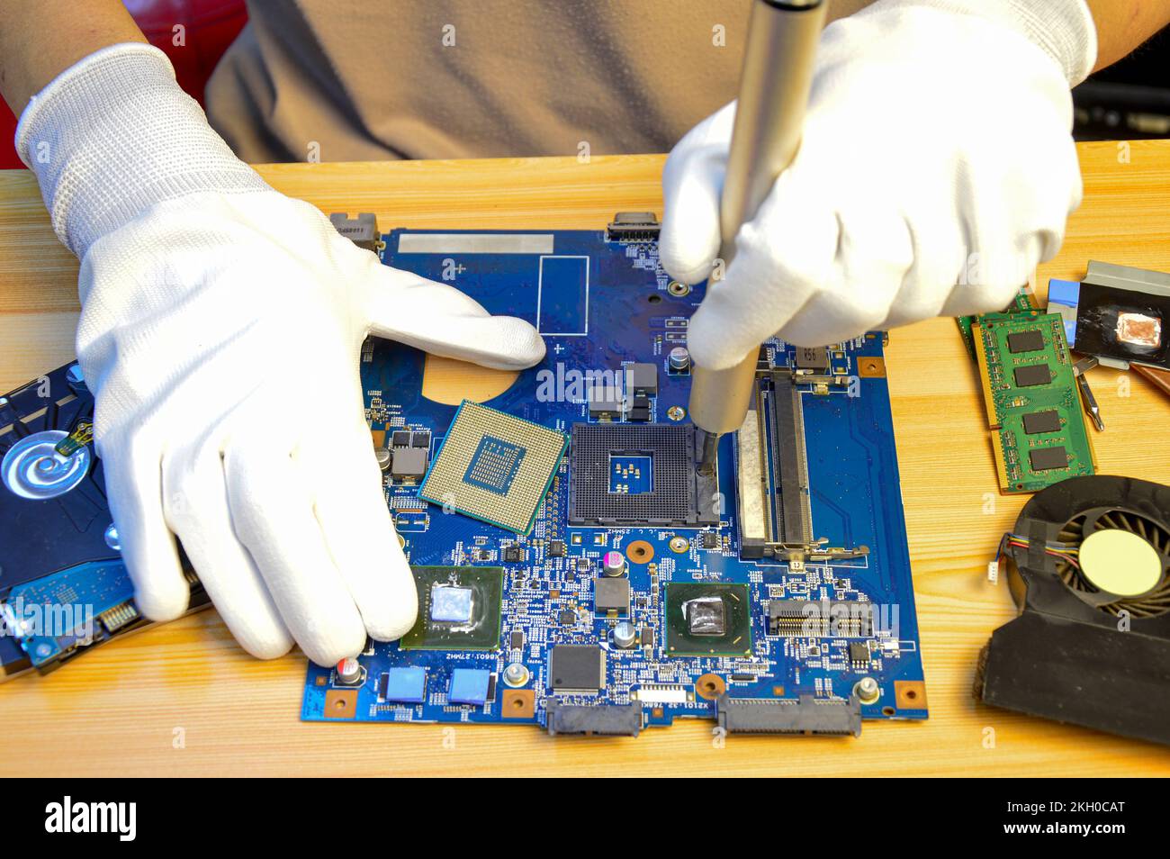 Technician repairing computer motherboard, notebook motherboard Stock ...