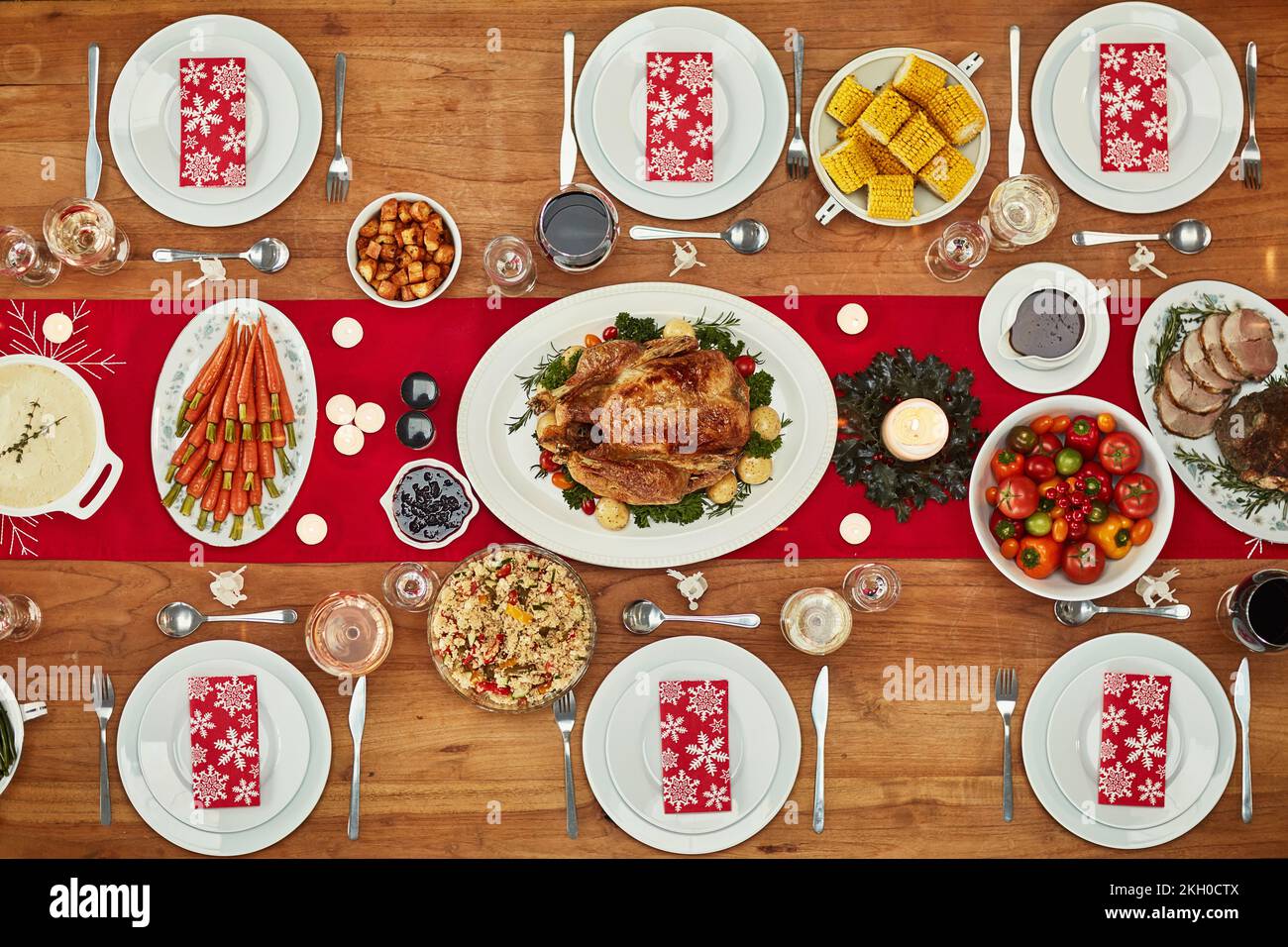 Christmas, party and food with a festive feast on a dinner table in a ...