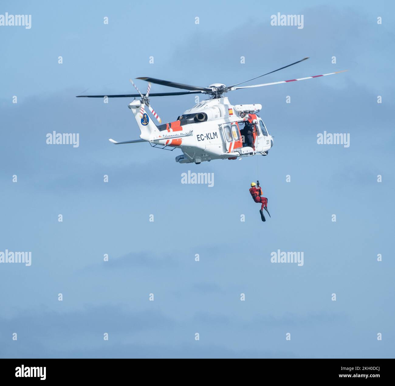 Helicopter winching person hi-res stock photography and images - Alamy