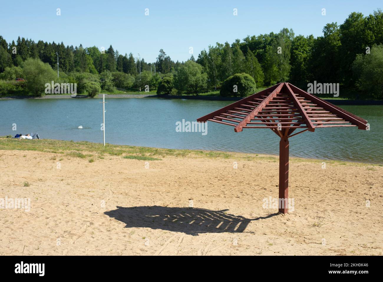 Beach on lake. Sand on shore. Place to relax. Beach without people ...