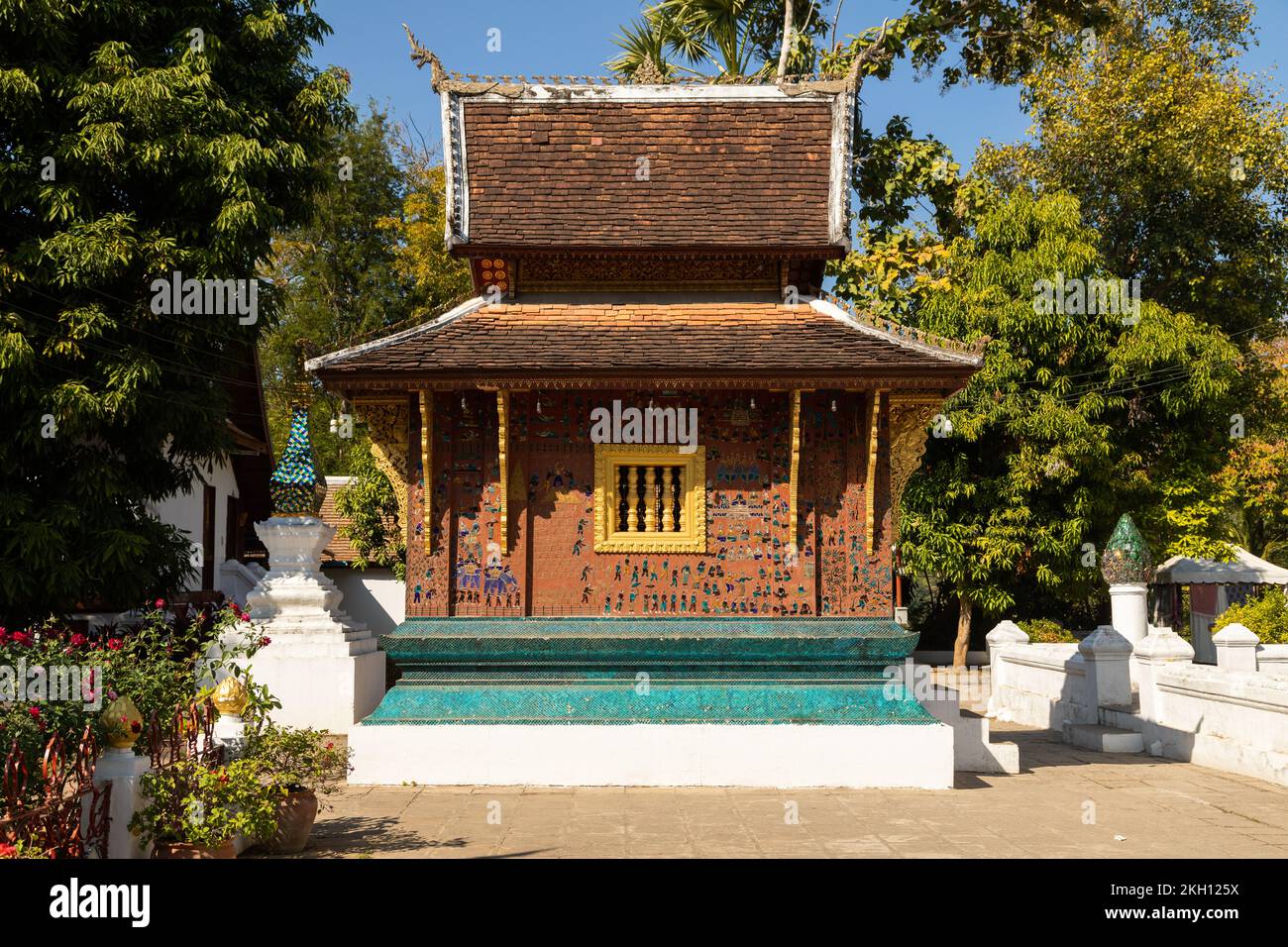 Buddhist building of traditional Lao architecture at Wat Xieng Thong ...