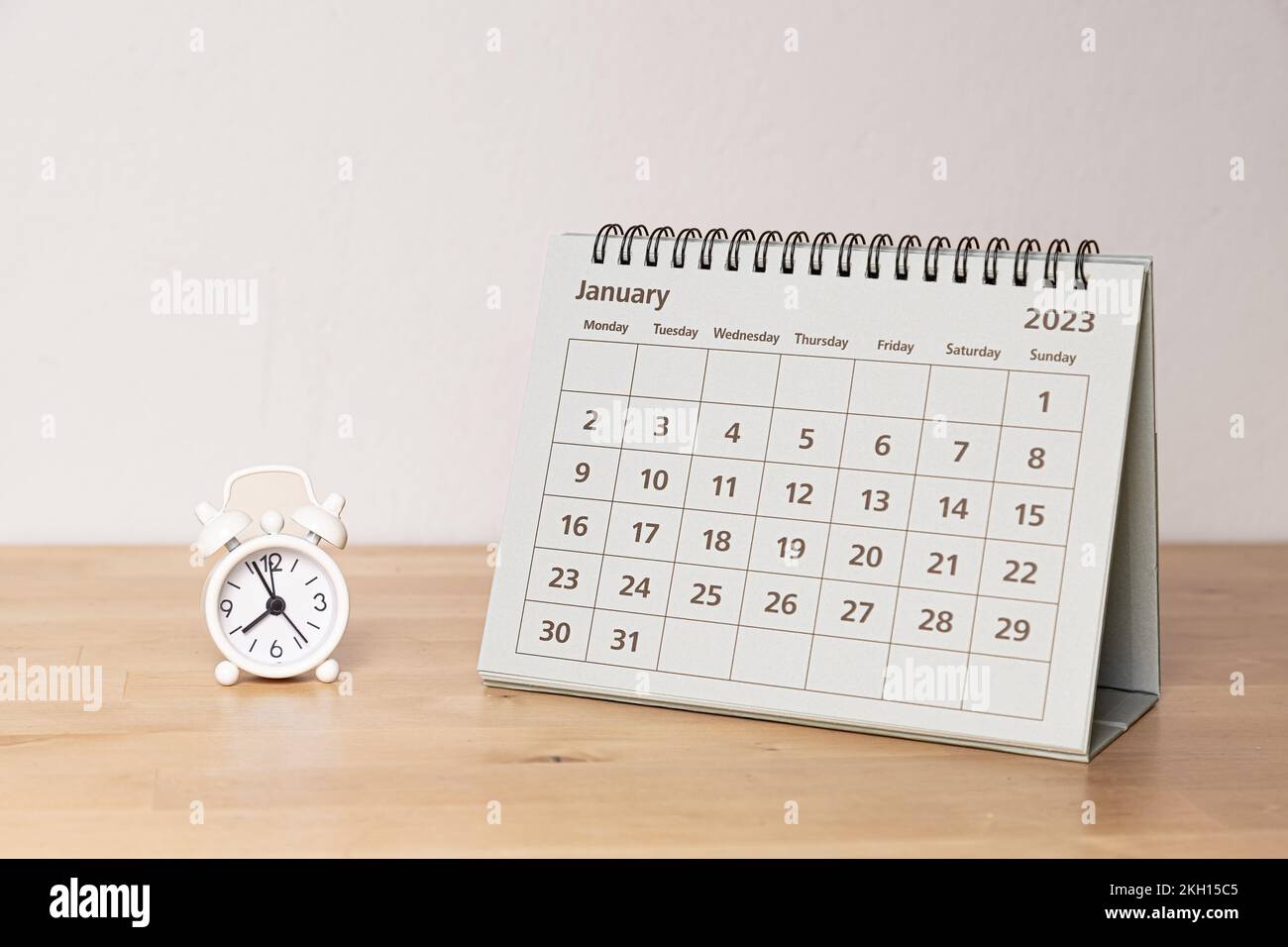 January 2023 calendar and small vintage clock on the desk Stock Photo ...