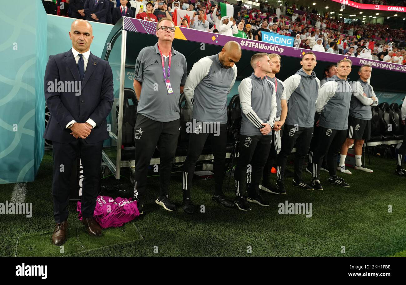 Belgium manager Roberto Martinez (left) and his coaching staff during ...