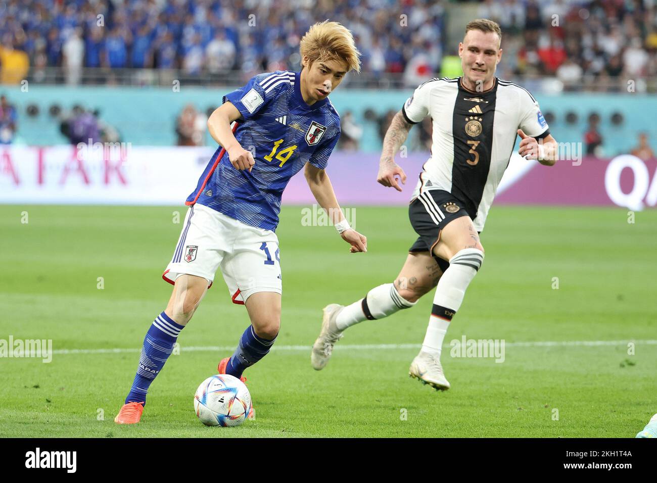 Junya Ito of Japan, David Raum of Germany during the FIFA World Cup ...
