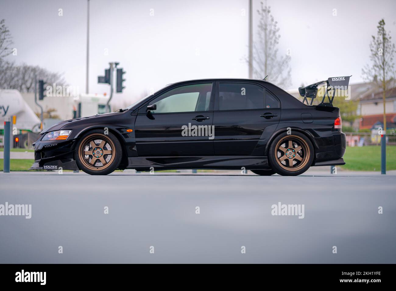 A side view of a tuned black Mitsubishi Evo 9 GT Stock Photo - Alamy