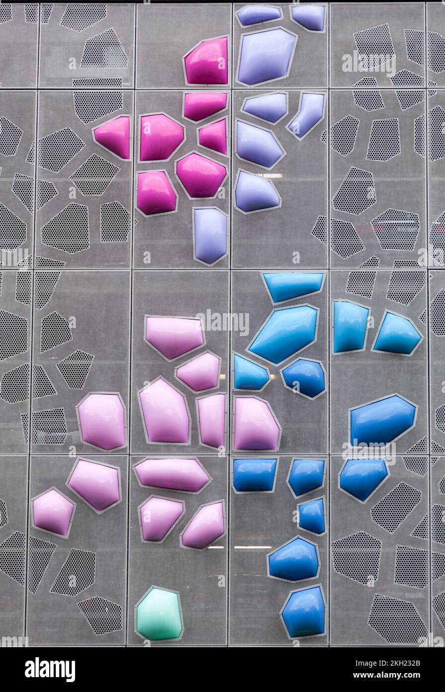 The abstract view of a colorful parking lot building exterior in ...