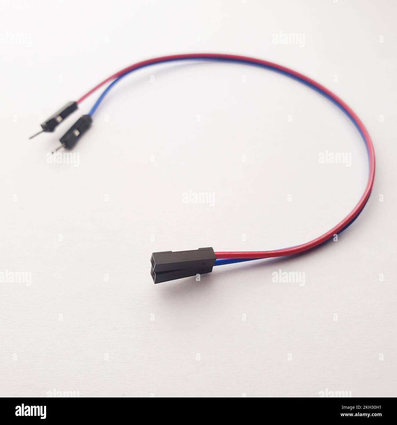 A connecting wire on a white background Stock Photo - Alamy