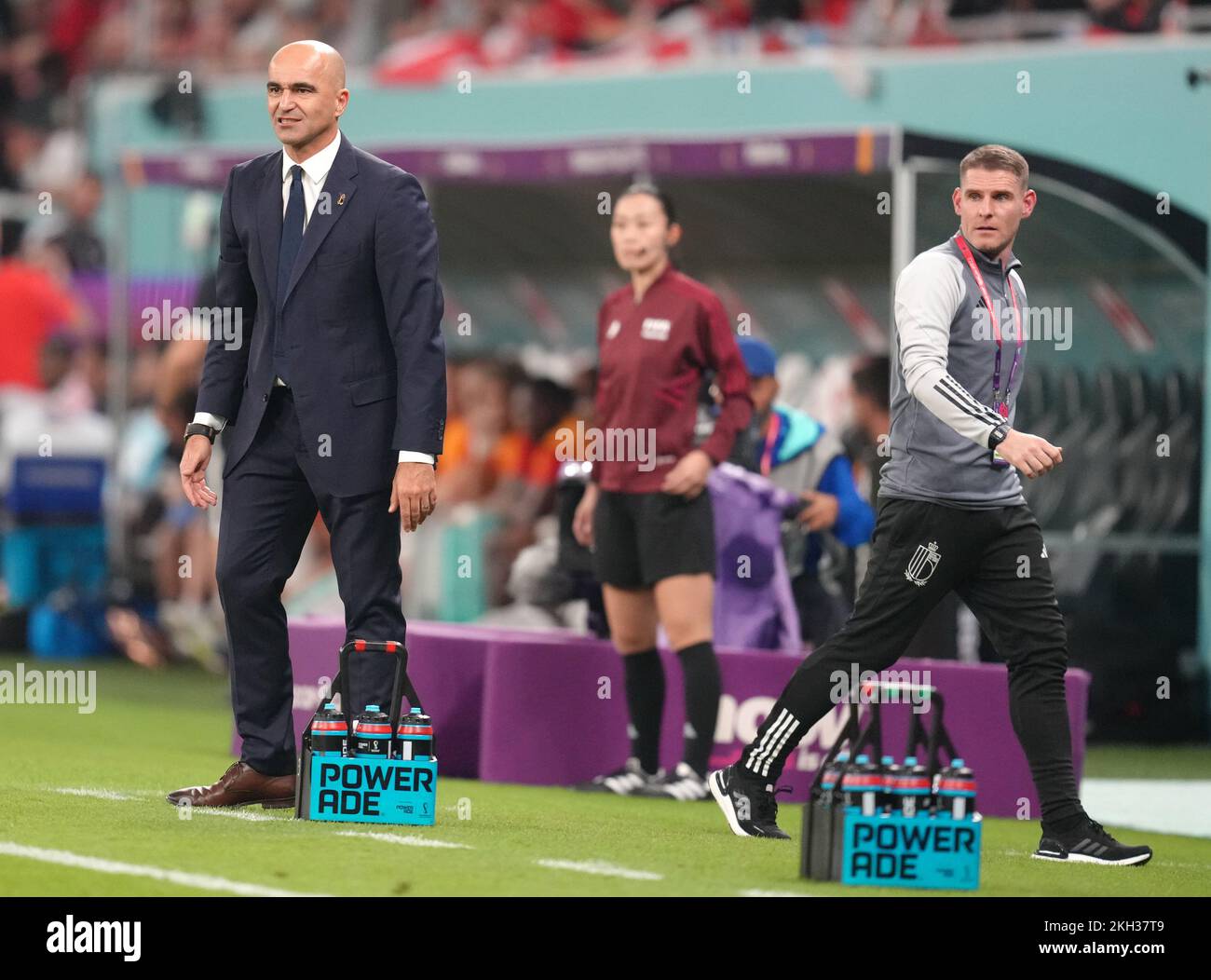 Belgium manager Roberto Martinez (left) and assistant Anthony Barry ...