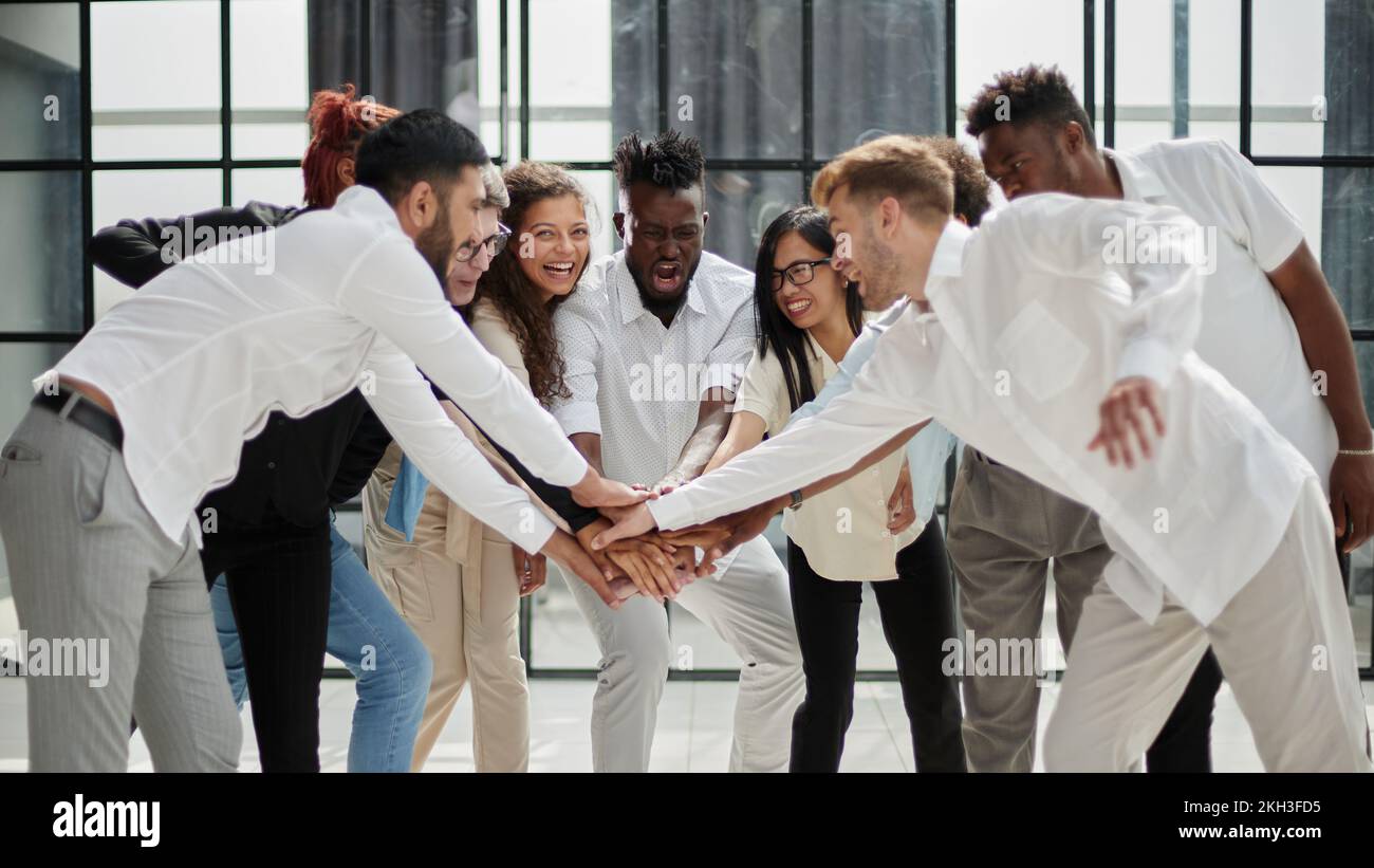 Teamwork and team spirit ,handshake in a group after work succe Stock ...