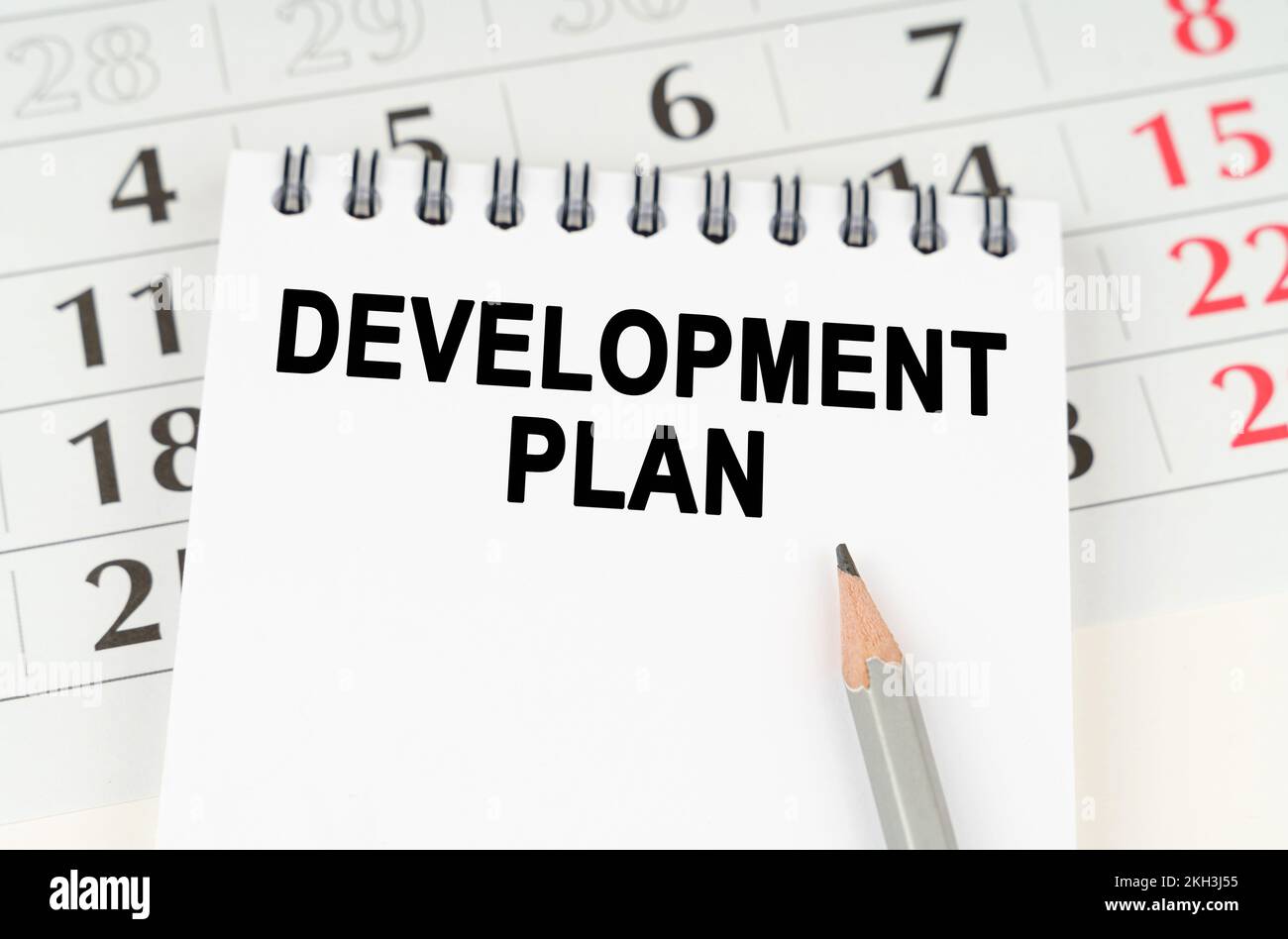 Business planning concept. On the calendar is a notebook with the ...