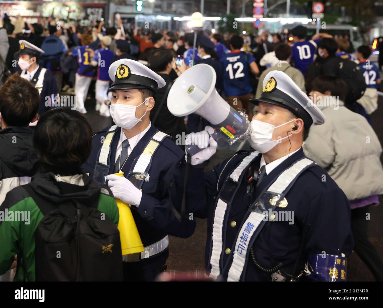 Tokyo, Japan. 24th Nov, 2022. Japanese football fans celebrate Japan's ...