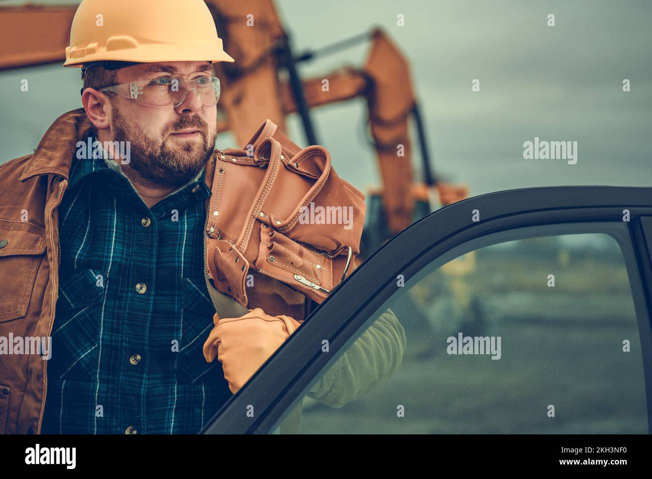 Caucasian Heavy Duty Construction Machinery Operator in Safety ...