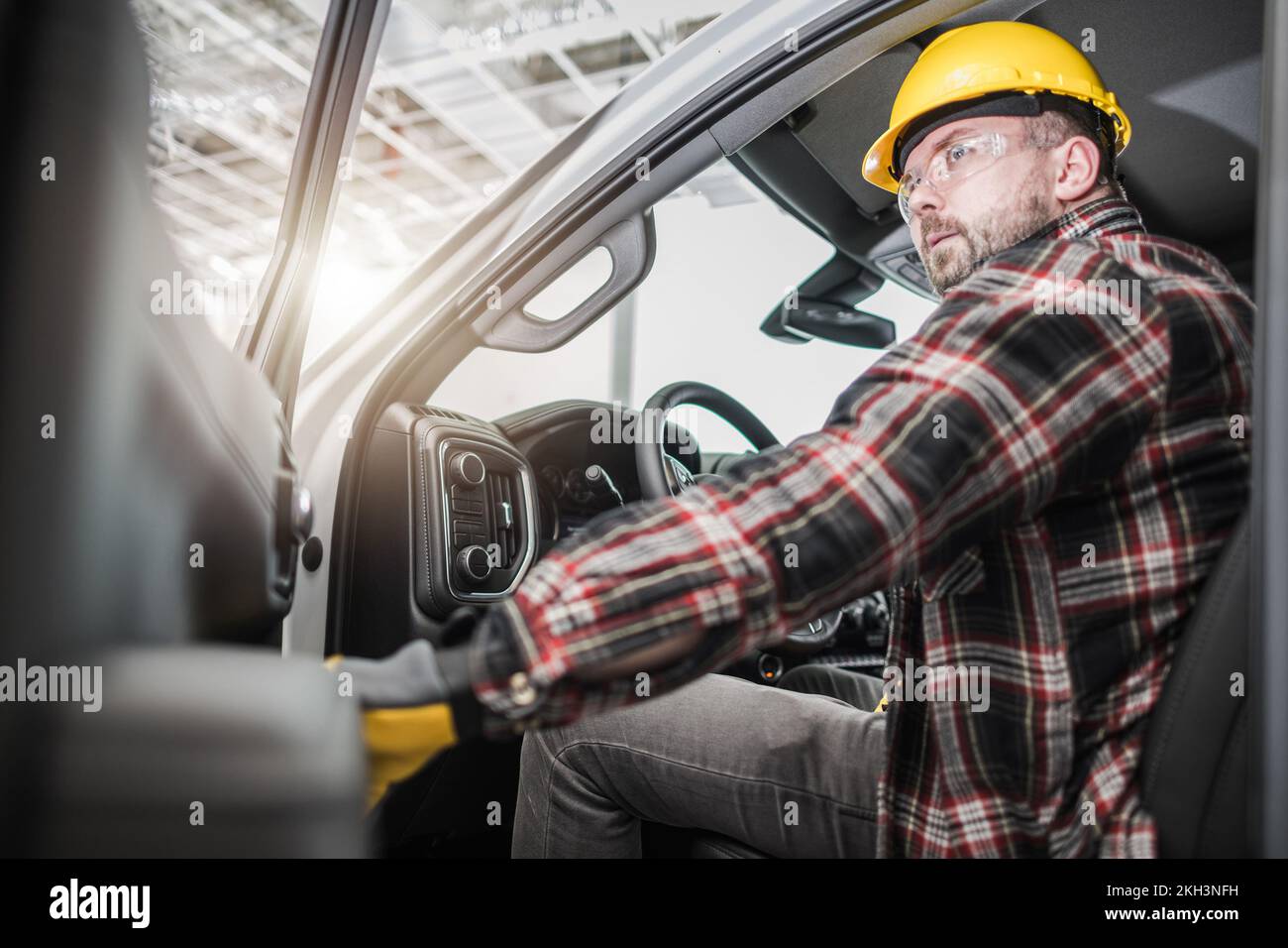 Caucasian Construction Supervisor at His 30s Sitting on the Driver's ...