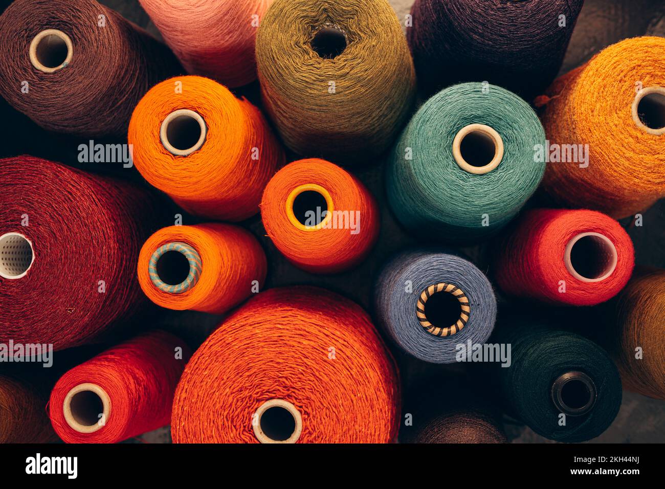 Composition of colorful vibrant wool threads from above. Autumn colours ...