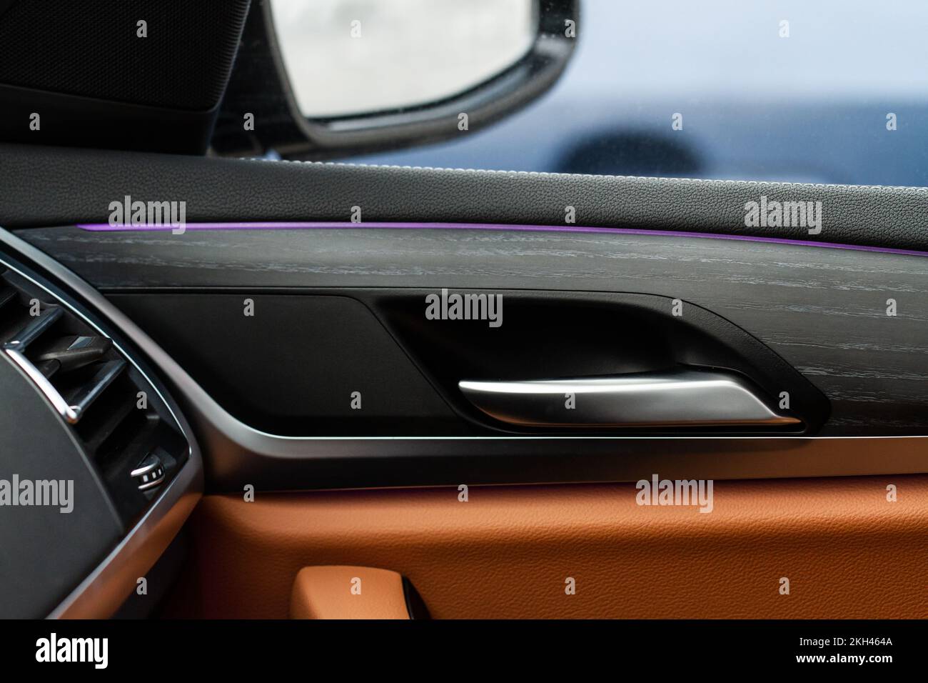 Modern car interior door handle close up. Metallic Car door opener ...