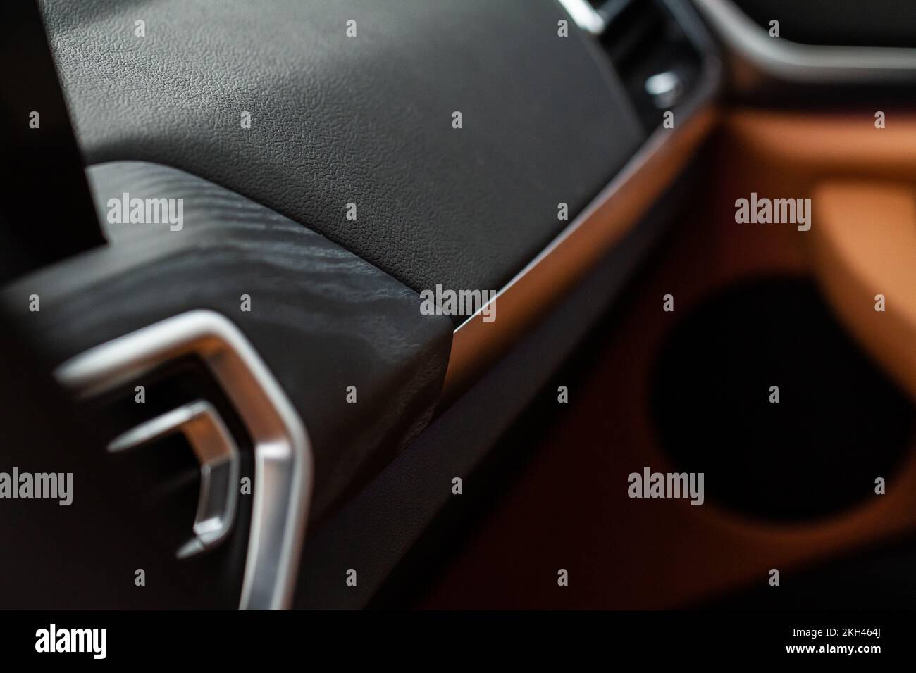 Modern car interior close up view with metallic and plastic details ...