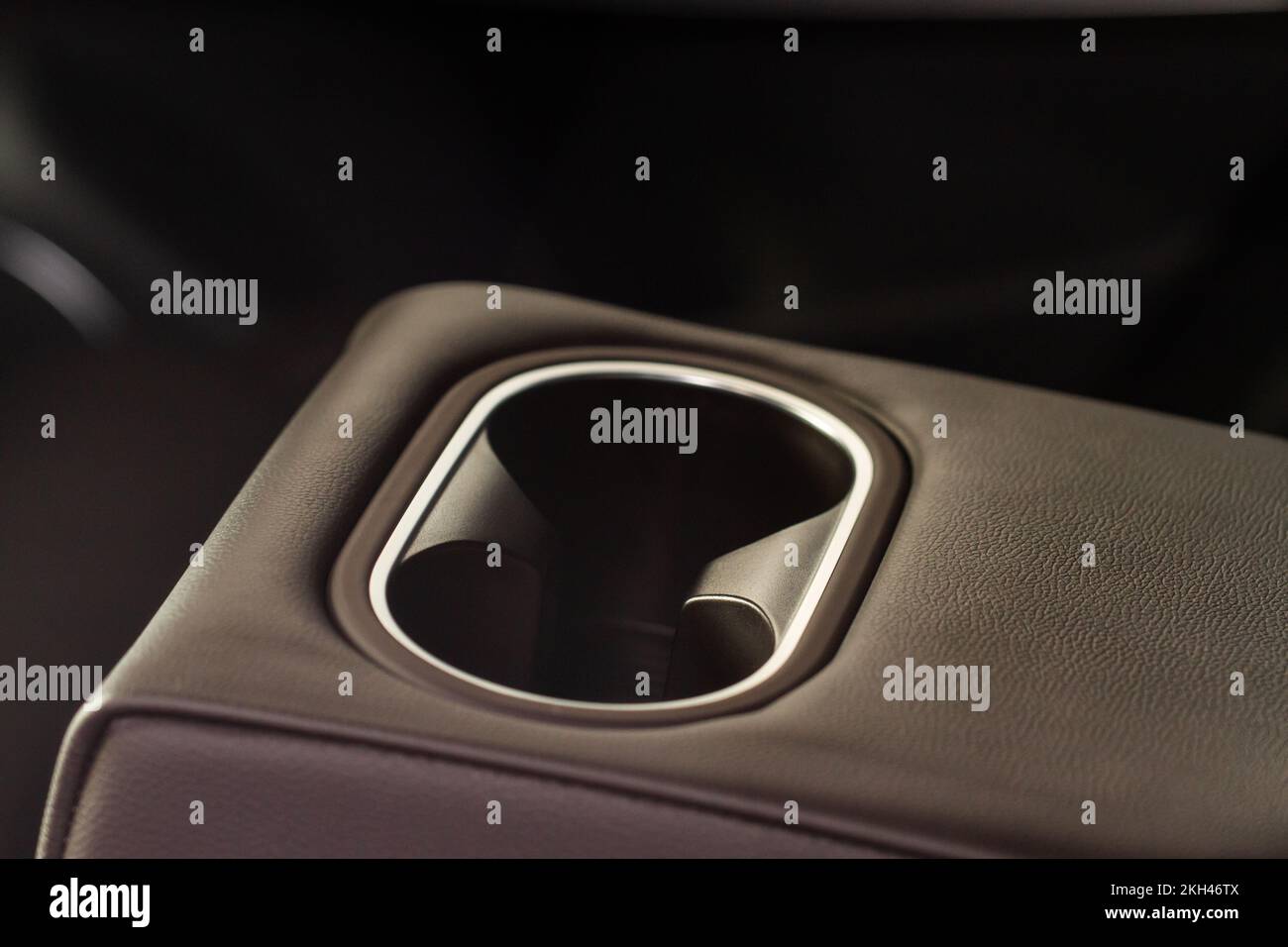 Cup holders inside modern car interior. Interior view of modern car ...