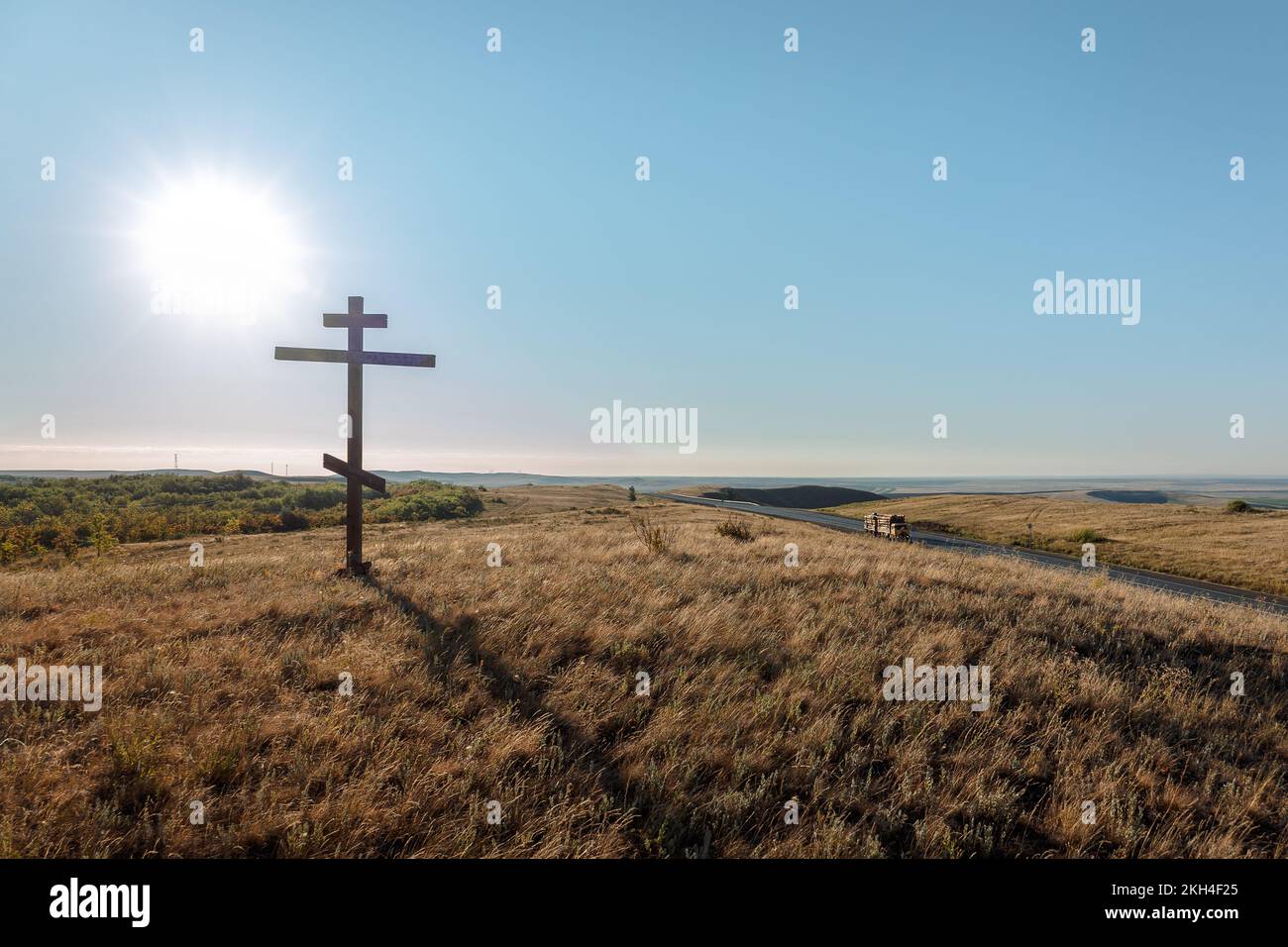 One Christian cross on hill. Early morning at dawn in summer. Sunrise ...