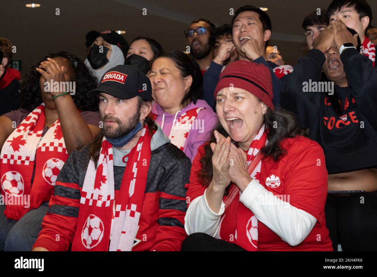 Fans cheer on Team Canada in their match against Belgium at the FIFA ...