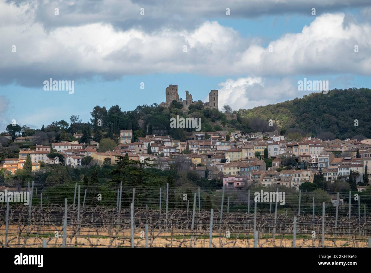 Grimaud a medieval village at the top of a hill from Massif des Maures ...