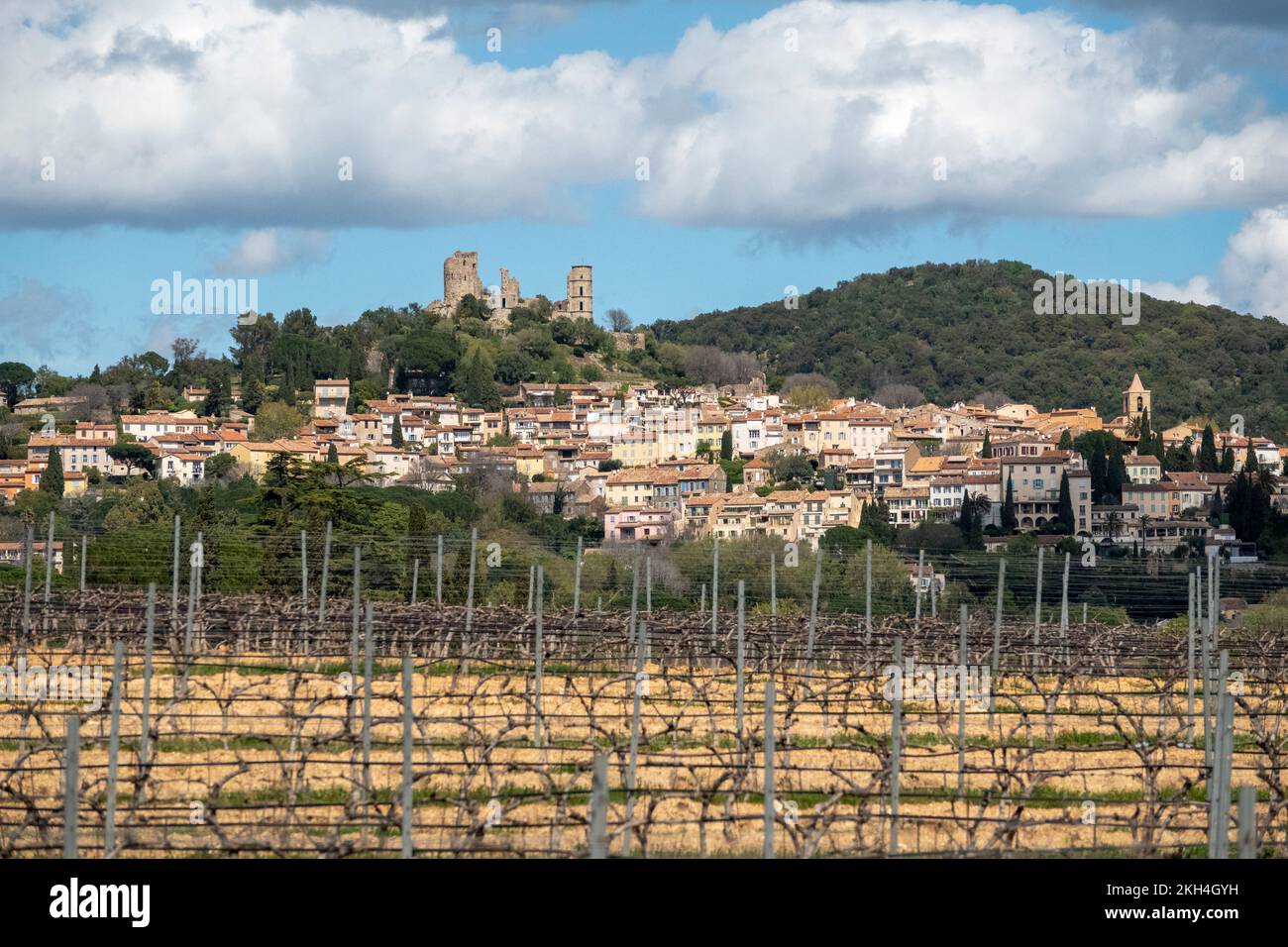 Grimaud a medieval village at the top of a hill from Massif des Maures ...