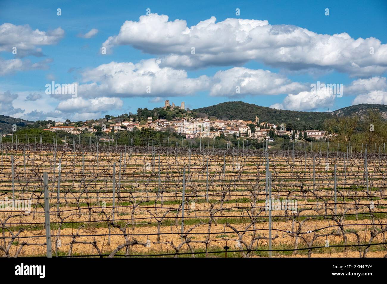Grimaud a medieval village at the top of a hill from Massif des Maures ...