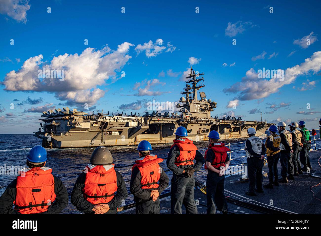 PHILIPPINE SEA (Nov. 22, 2022) Sailors stand at parade rest aboard ...