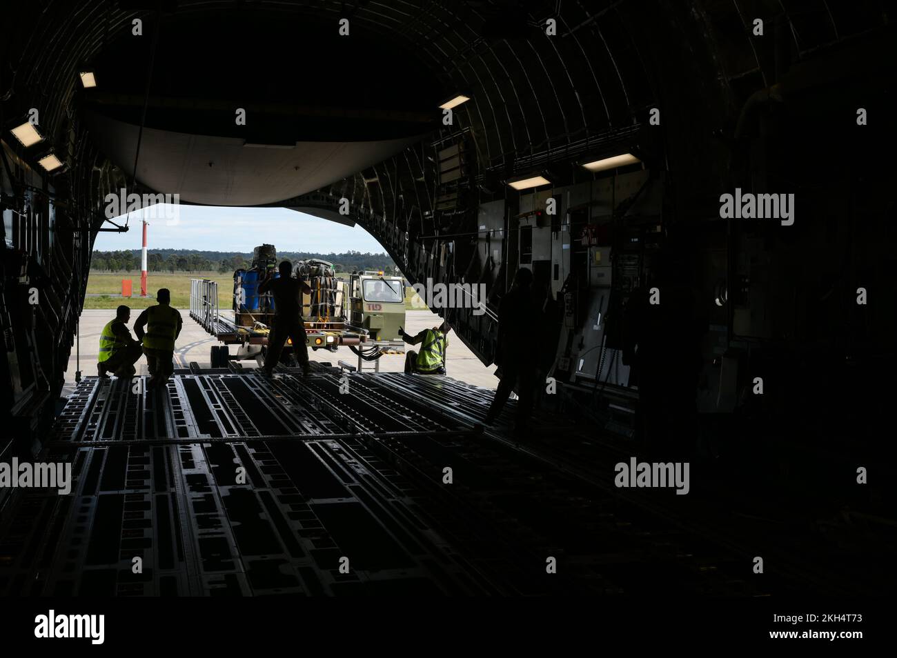 A joint precision airdrop system bundle is deployed from a U.S. Air ...
