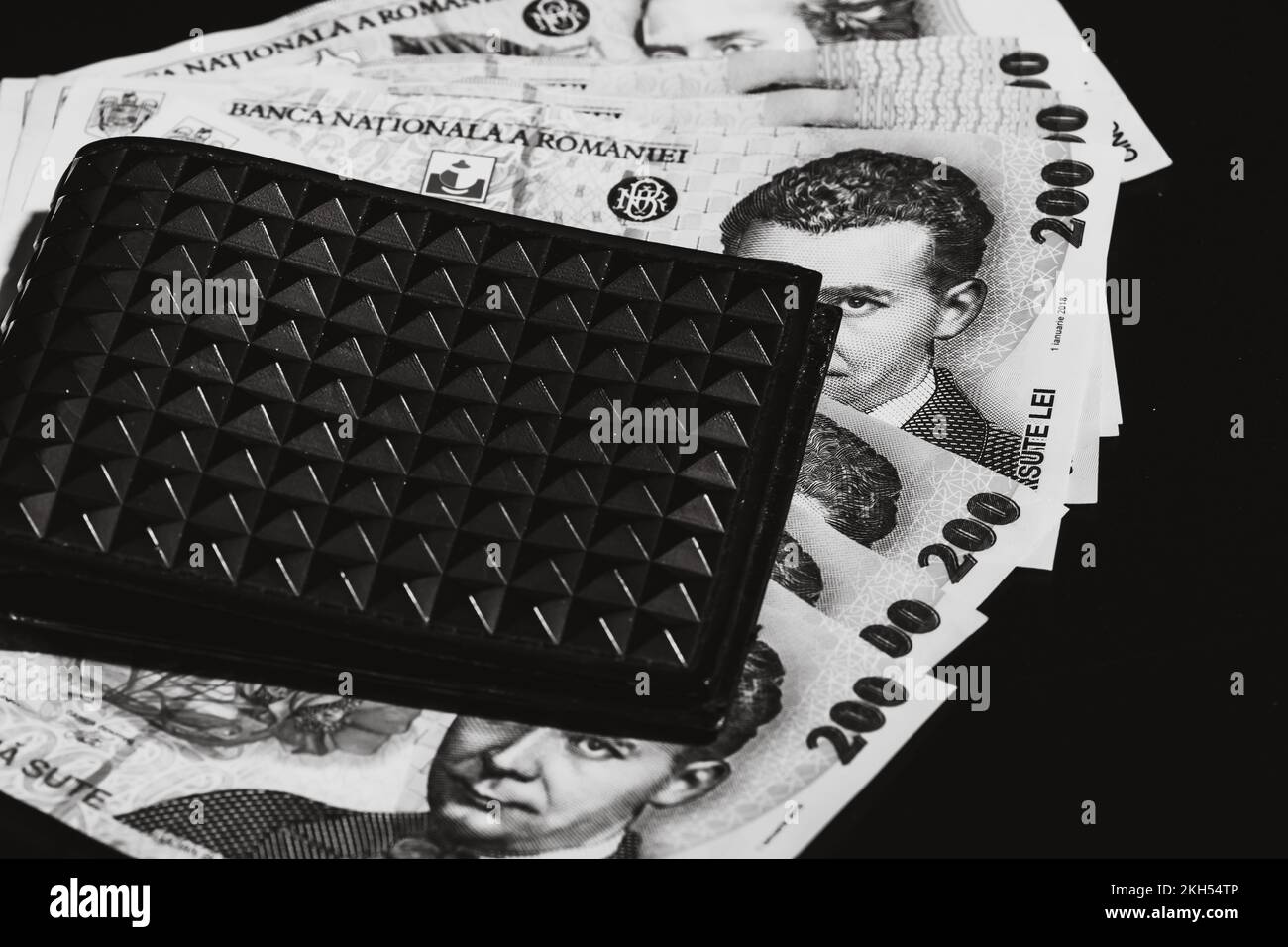 LEI romanian money banknotes in black wallet isolated Stock Photo - Alamy