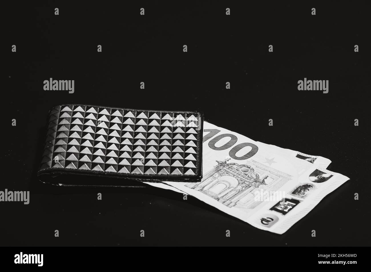 100 Euro money banknotes in black wallet isolated Stock Photo - Alamy