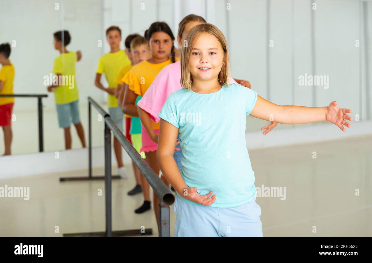 Children exercising ballet moves in studio Stock Photo - Alamy