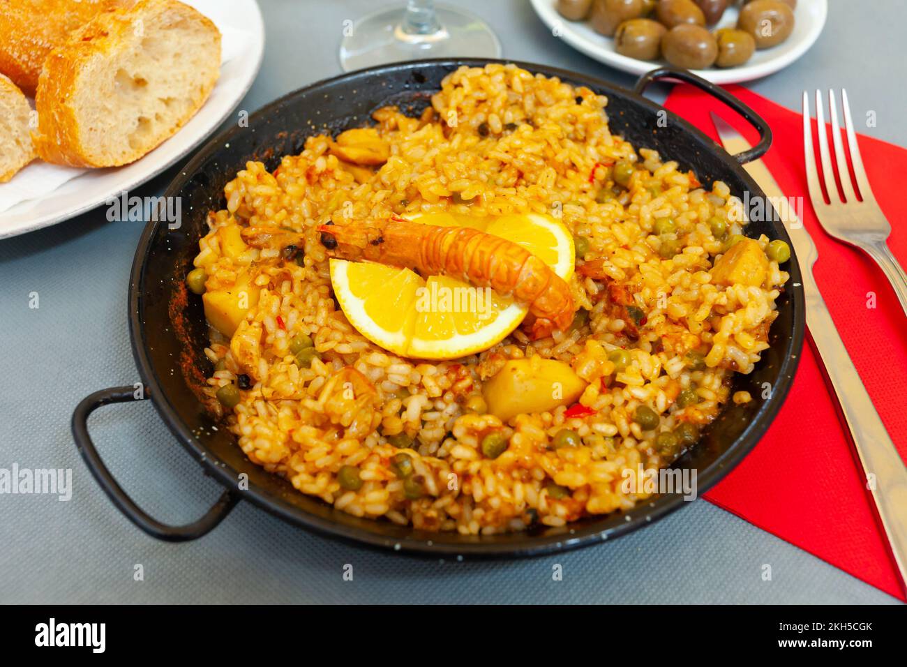Spainsh dish seafood paella with rice, shrimps and mussels Stock Photo ...