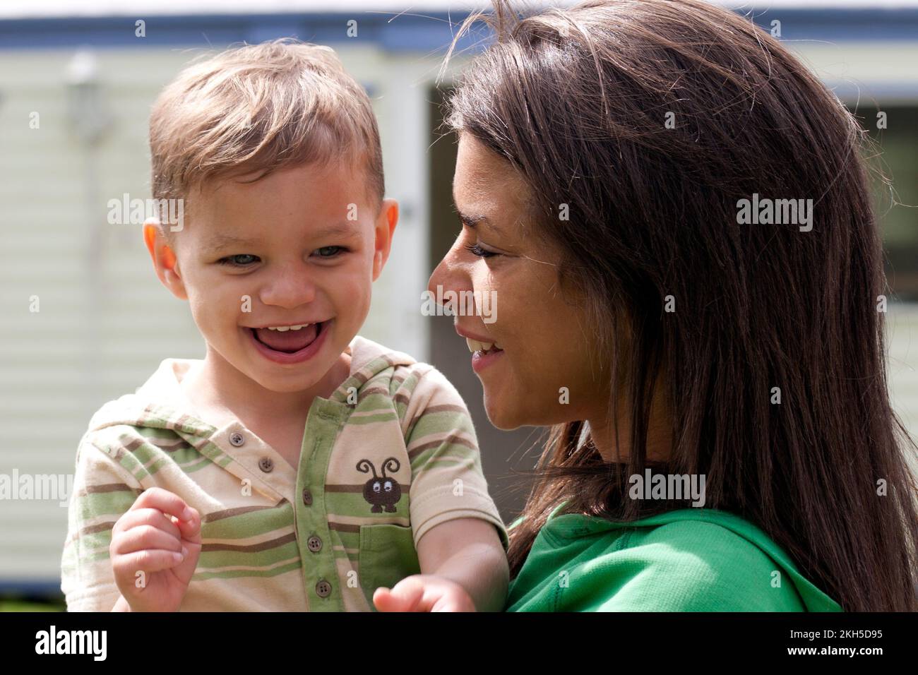 young woman with happy little boy Stock Photo - Alamy
