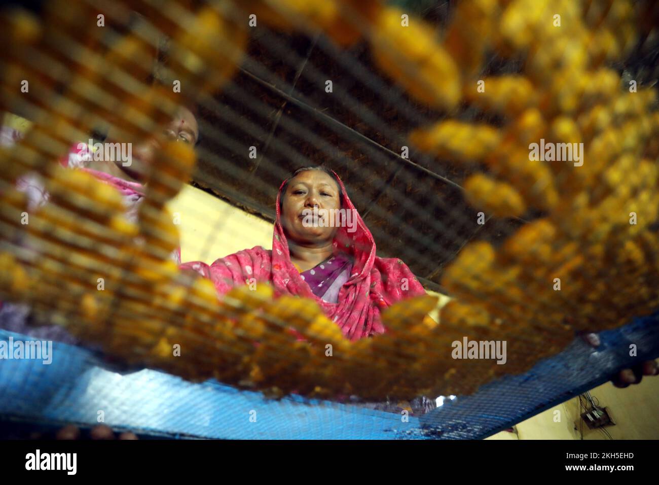 November 23, 2022, Kaptai, Rangamati, Bangladesh: Workers at yellow ...