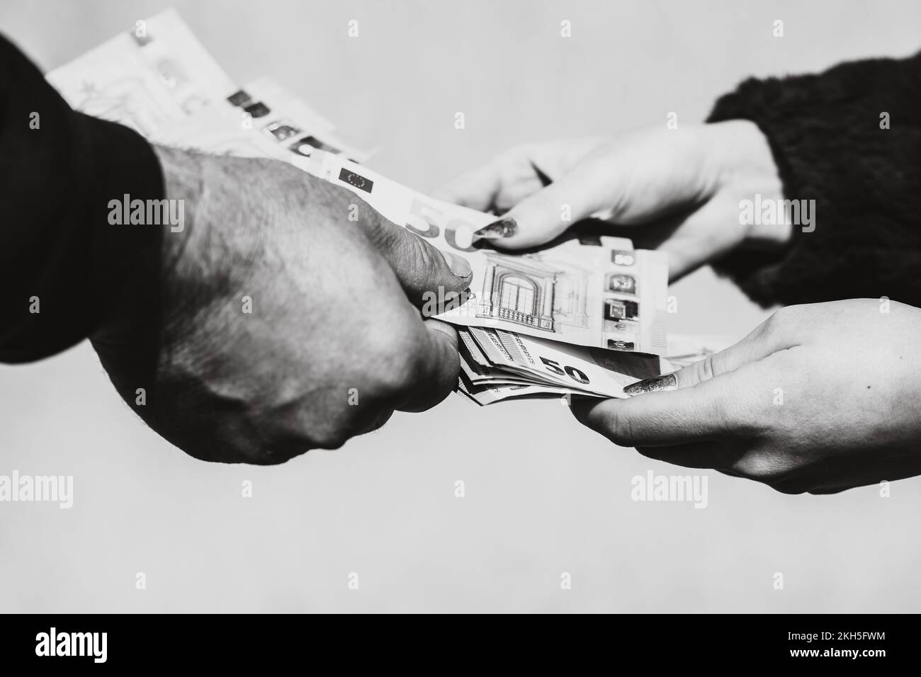 Hand giving money like bribe or tips or salary isolated, hard worked ...