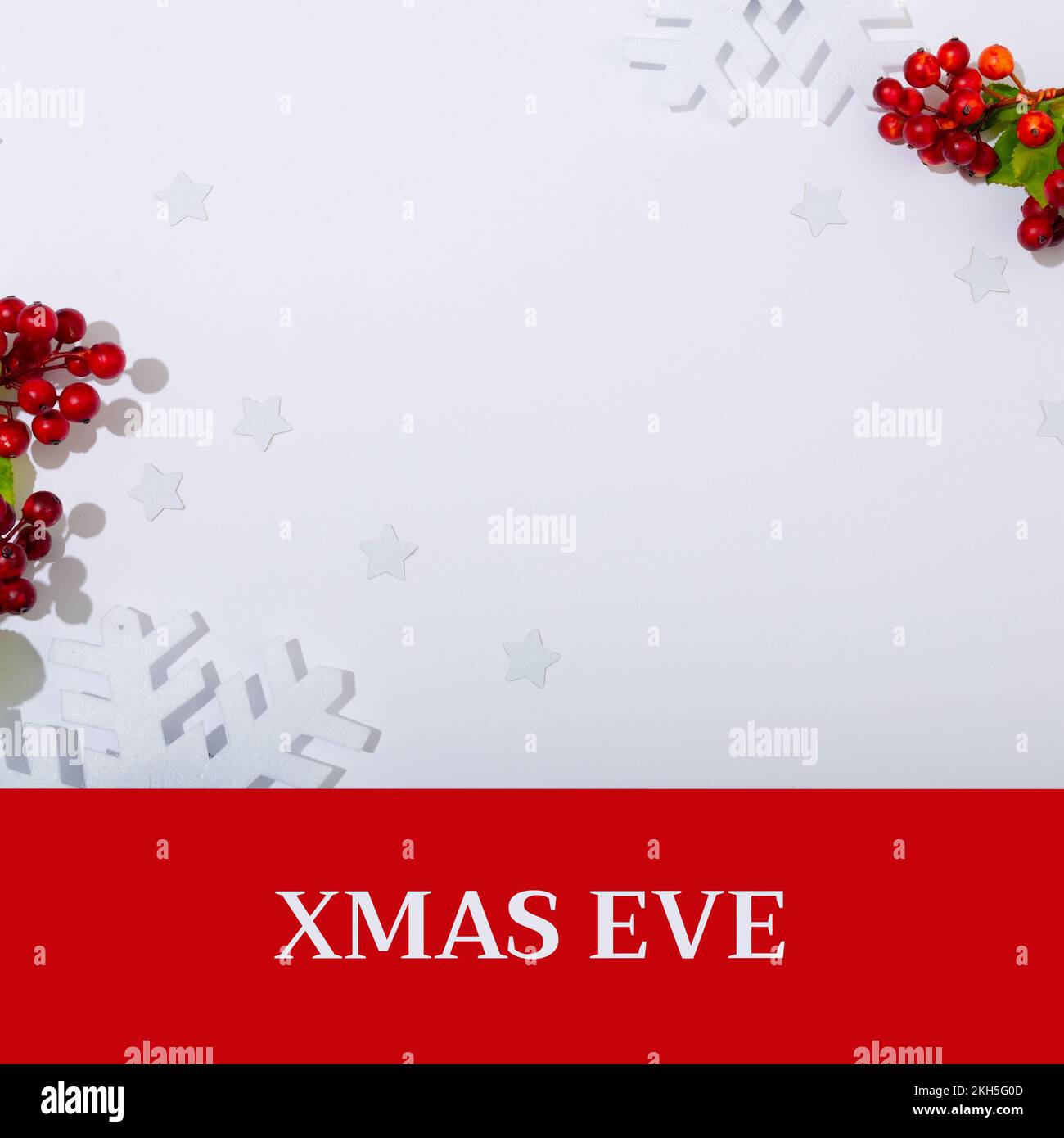 Composition of christmas eve text over christmas decoration Stock Photo ...