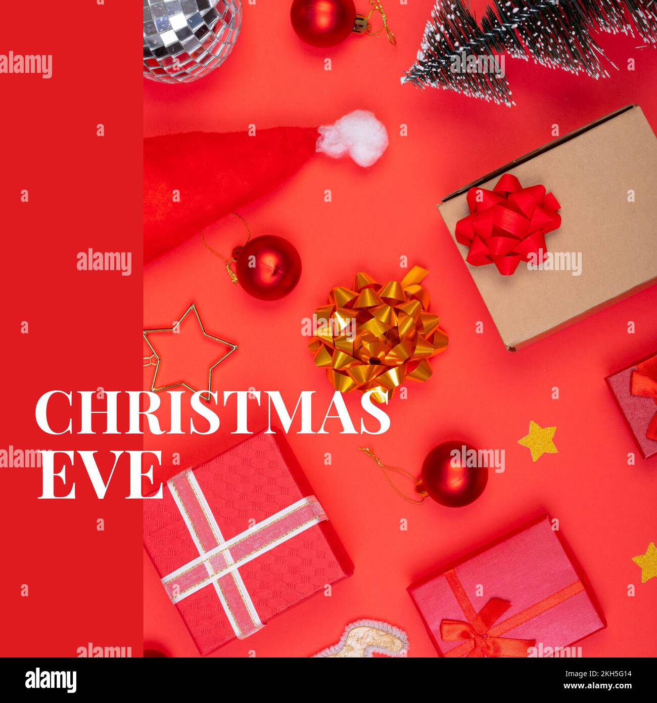 Composition of christmas eve text over christmas decoration Stock Photo ...