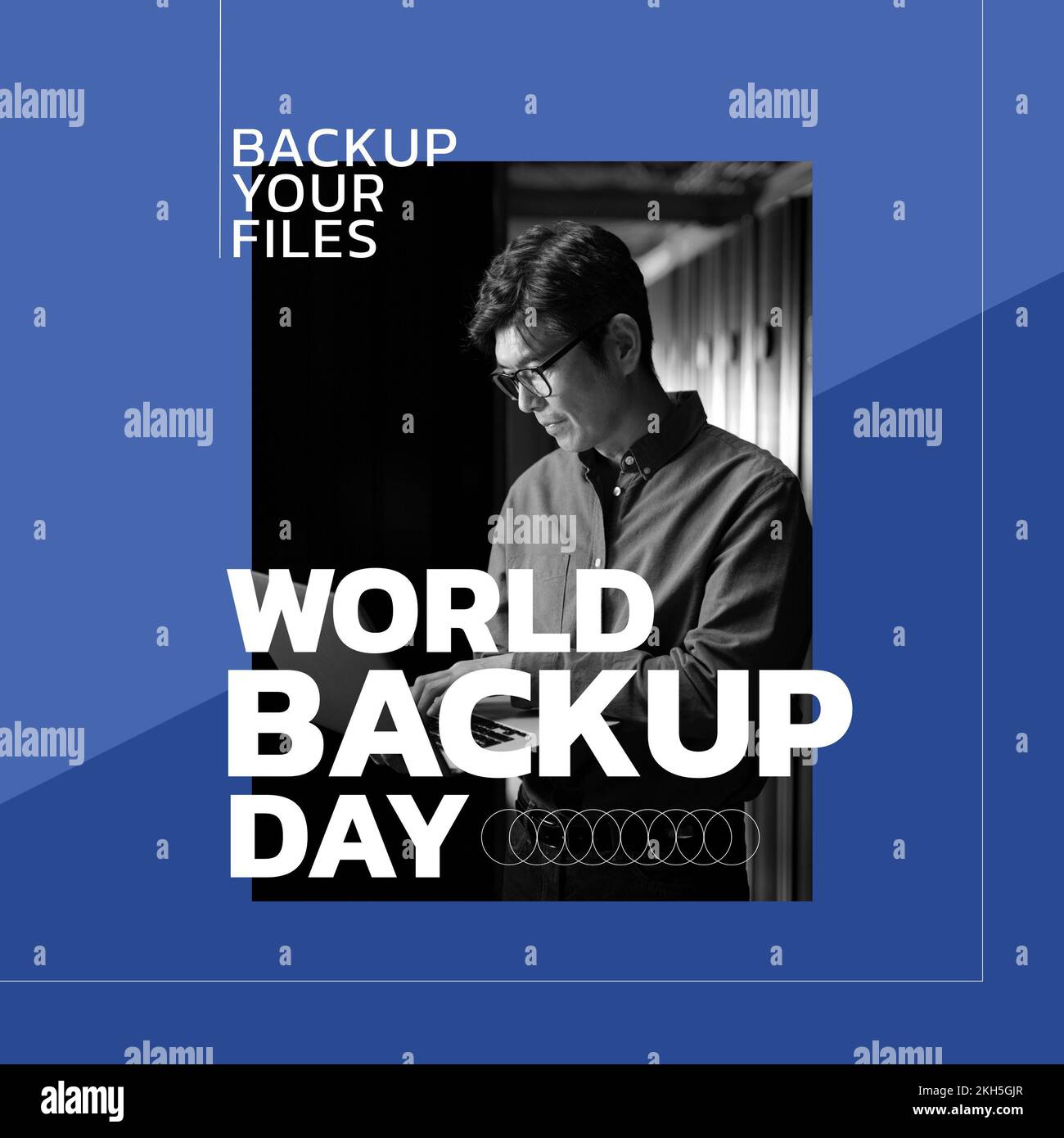 Composition of world backup day text over asian man using laptop Stock ...