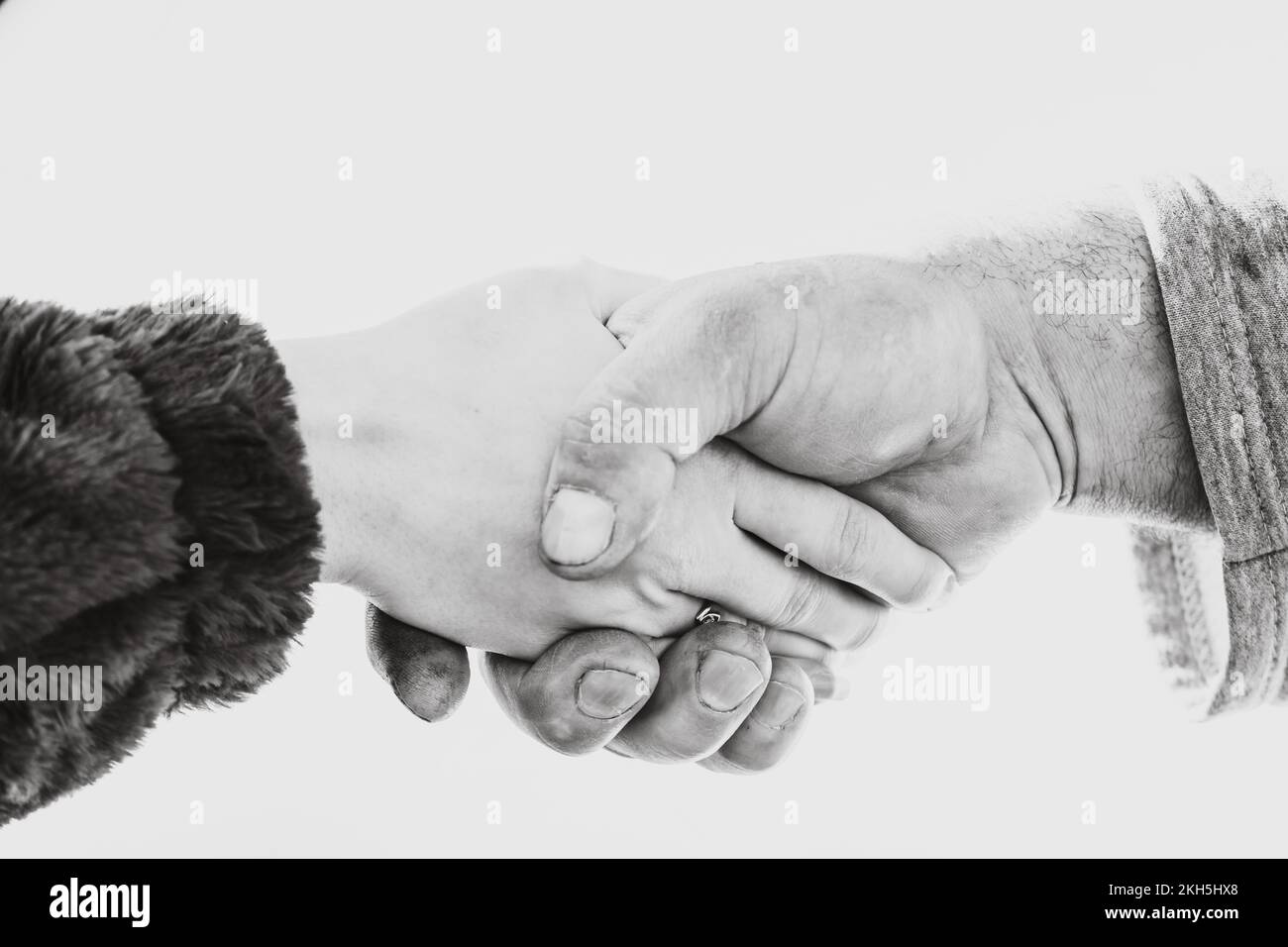 Two people touching and shaking hands. Hard worked hand, business ...