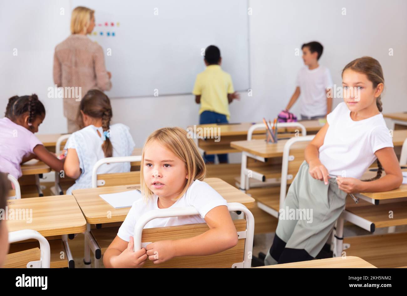 Kids pupils talking during recess between lessons Stock Photo - Alamy