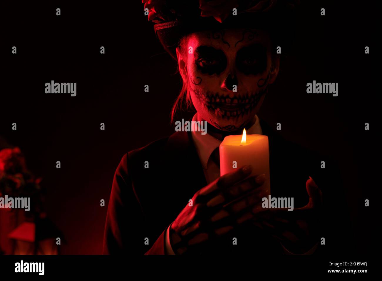 Woman In Santa Muerte Goddess Costume Blowing Candle Flame Posing For 2310