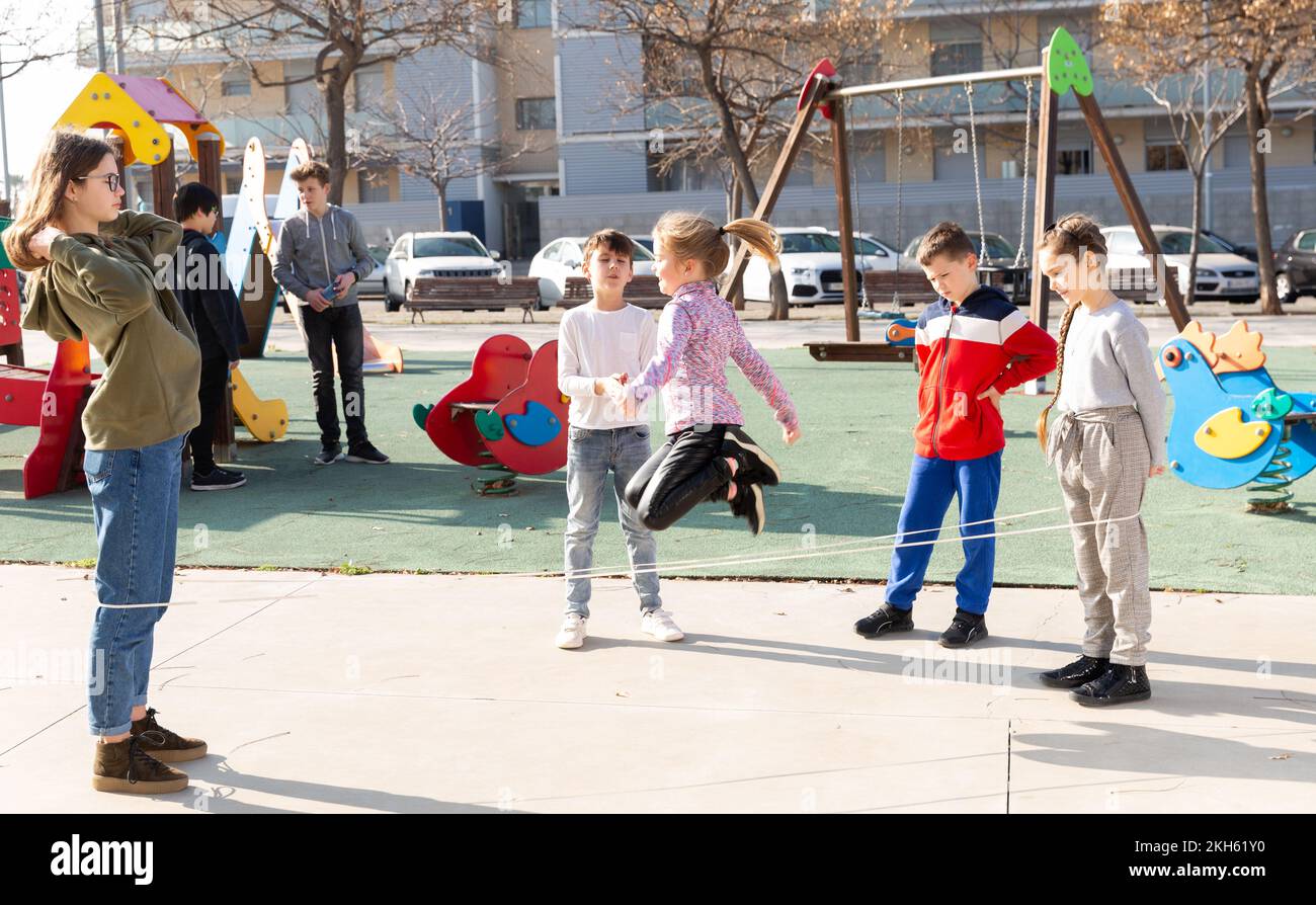 Children girls skipping rope hi-res stock photography and images - Alamy
